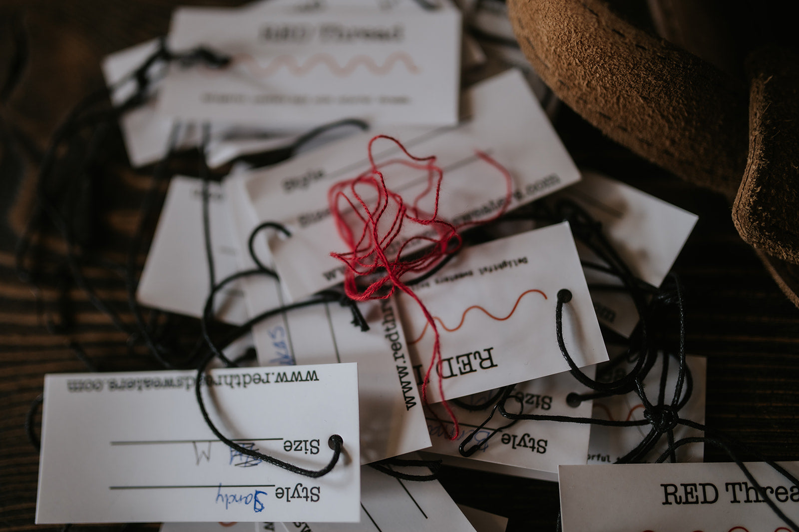 Wholesale – Red Thread sweaters